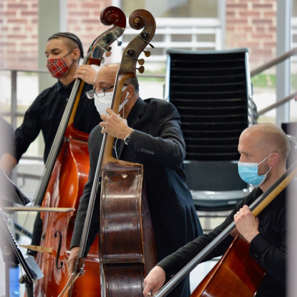 School band teacher and student play side-by-side at the CSO ...